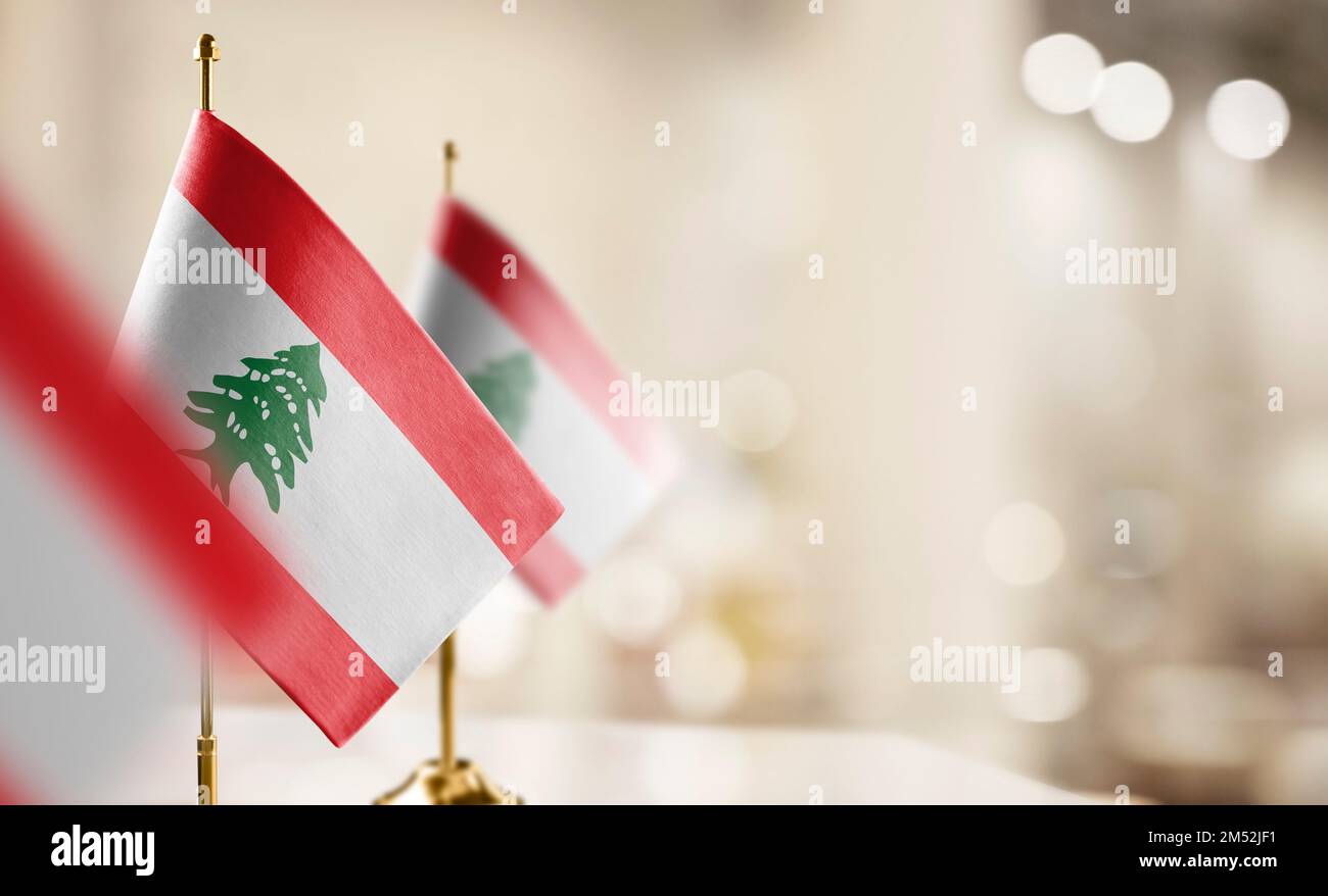 Small flags of the Lebanon on an abstract blurry background Stock Photo ...
