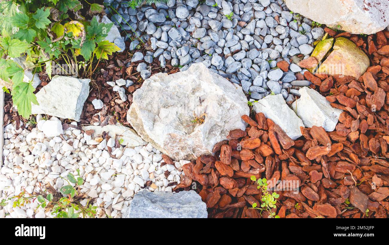 A top view closeup of different types of colorful stones, a rocky ...