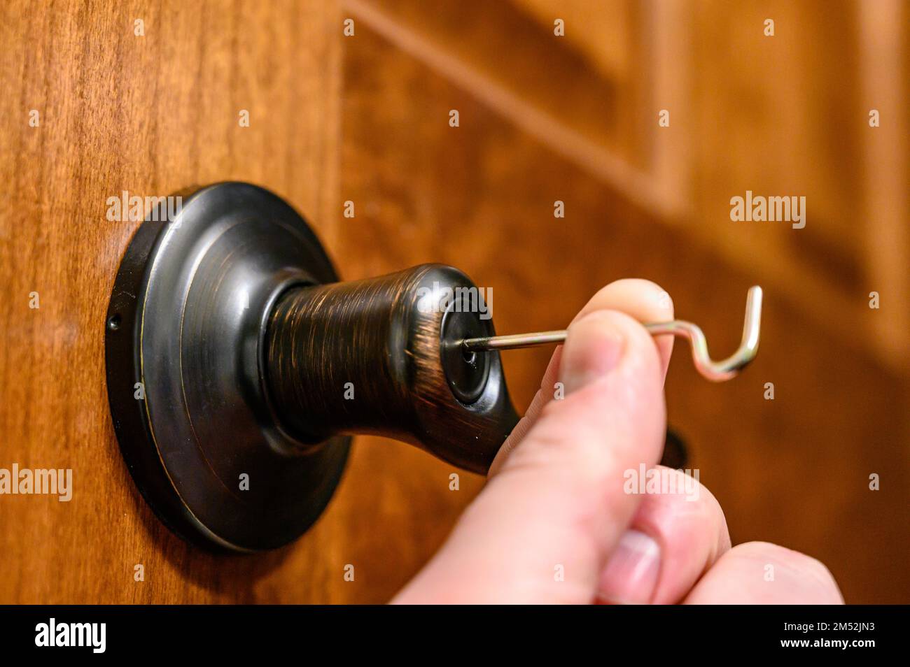 Oiled brass interior bedroom door handle with unlocking pin Stock Photo ...