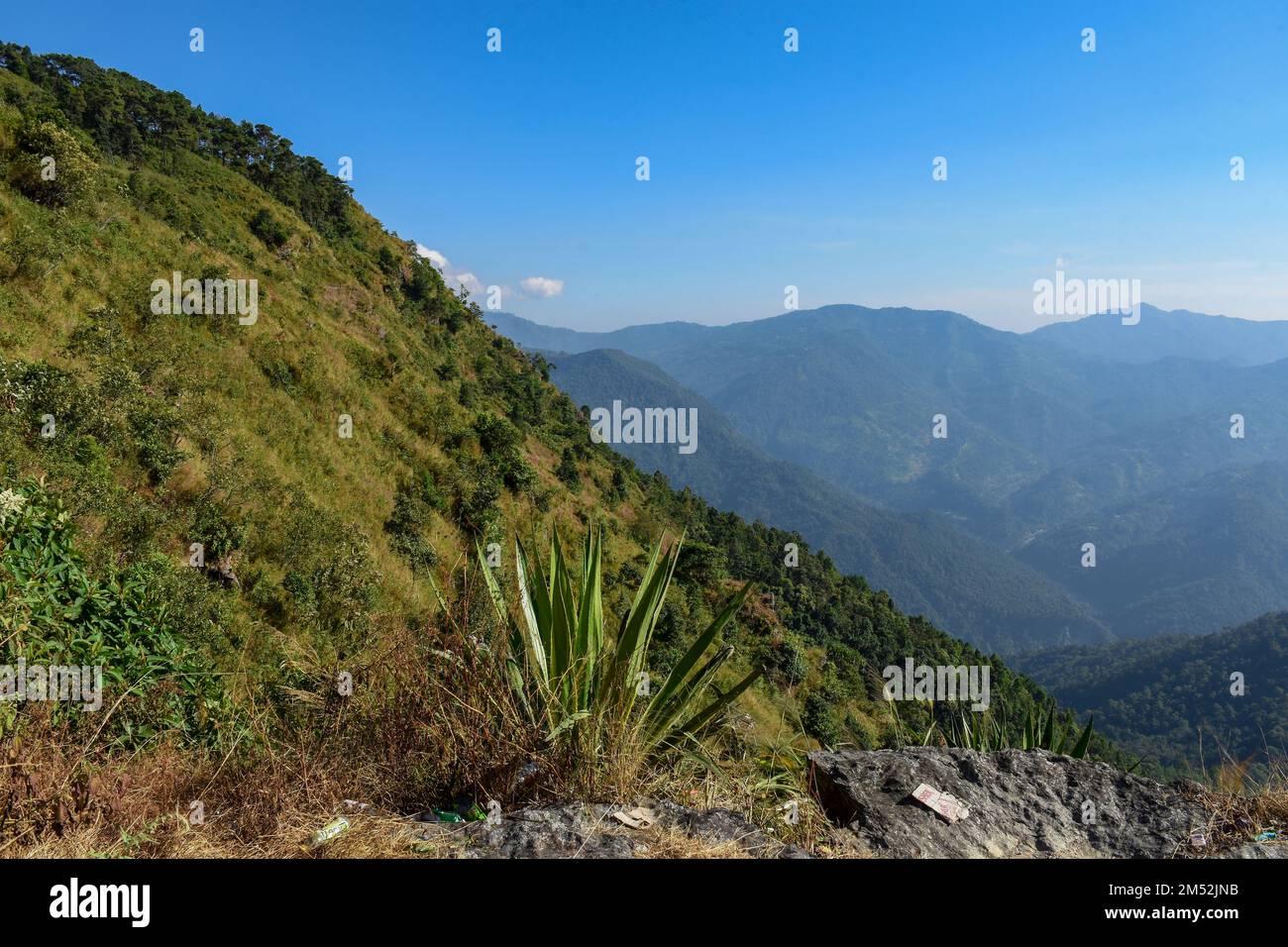 Landscape with mountains and a cloudy blue sky. Panoramic view of ...