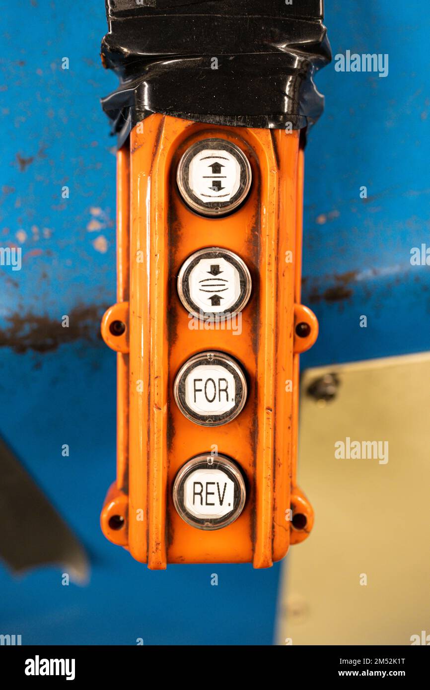 Factory equipment control panel buttons in metal roofing Workshop Stock ...