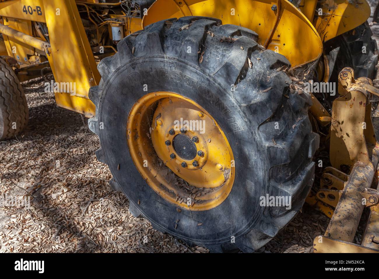 Wheel of front loader Stock Photo - Alamy