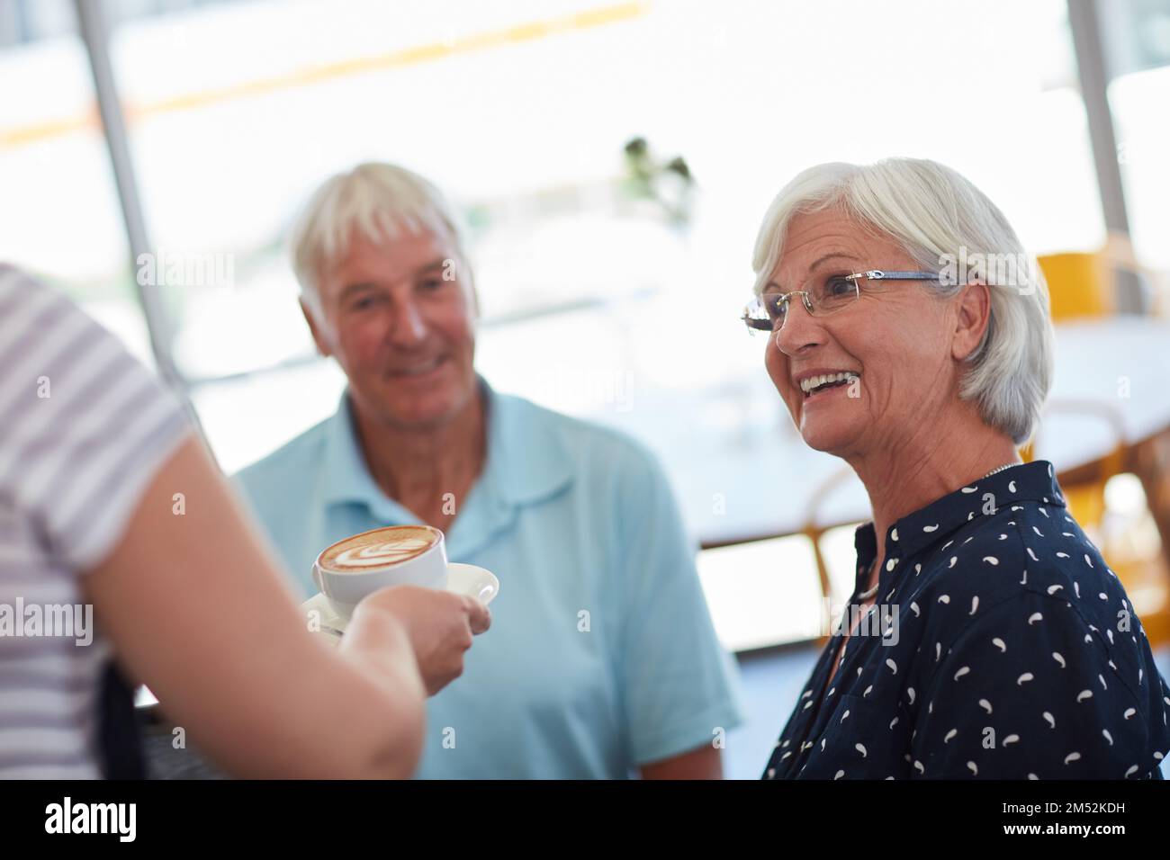 Im impressed with the service at this cafe. a senior couple being ...