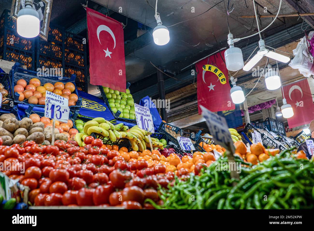 The Turkish flag behind the fruits and vegetables in a greengrocer in ...