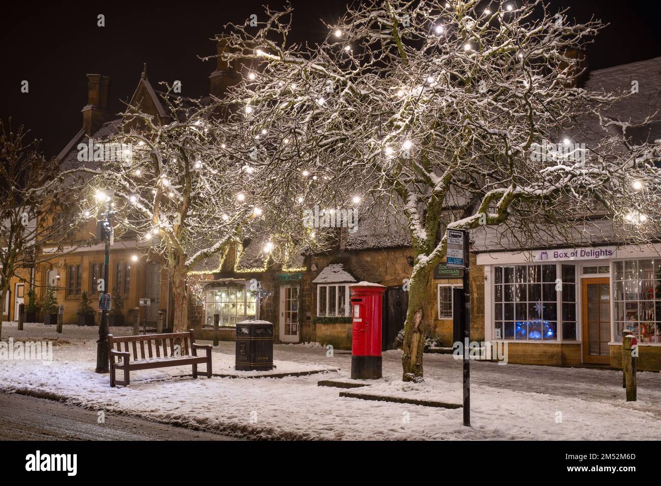 Broadway village and Christmas tree light decorations at night in the ...