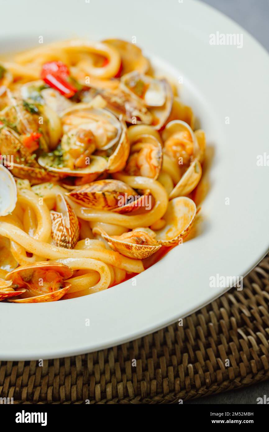 Spicy and delicious Chinese food Clam Mara stir-fried noodle dish Stock ...