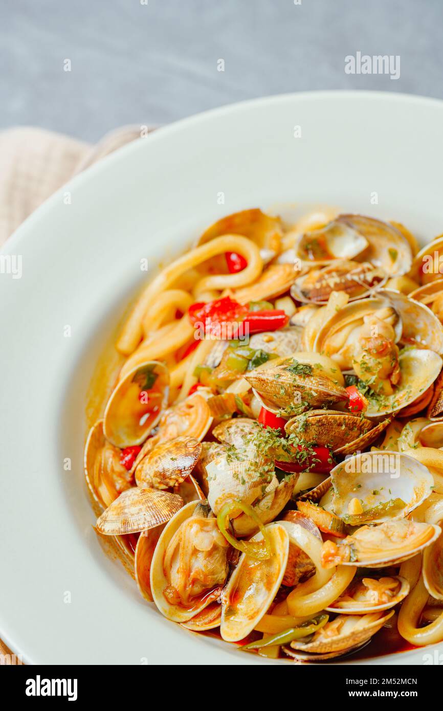 Spicy and delicious Chinese food Clam Mara stir-fried noodle dish Stock ...