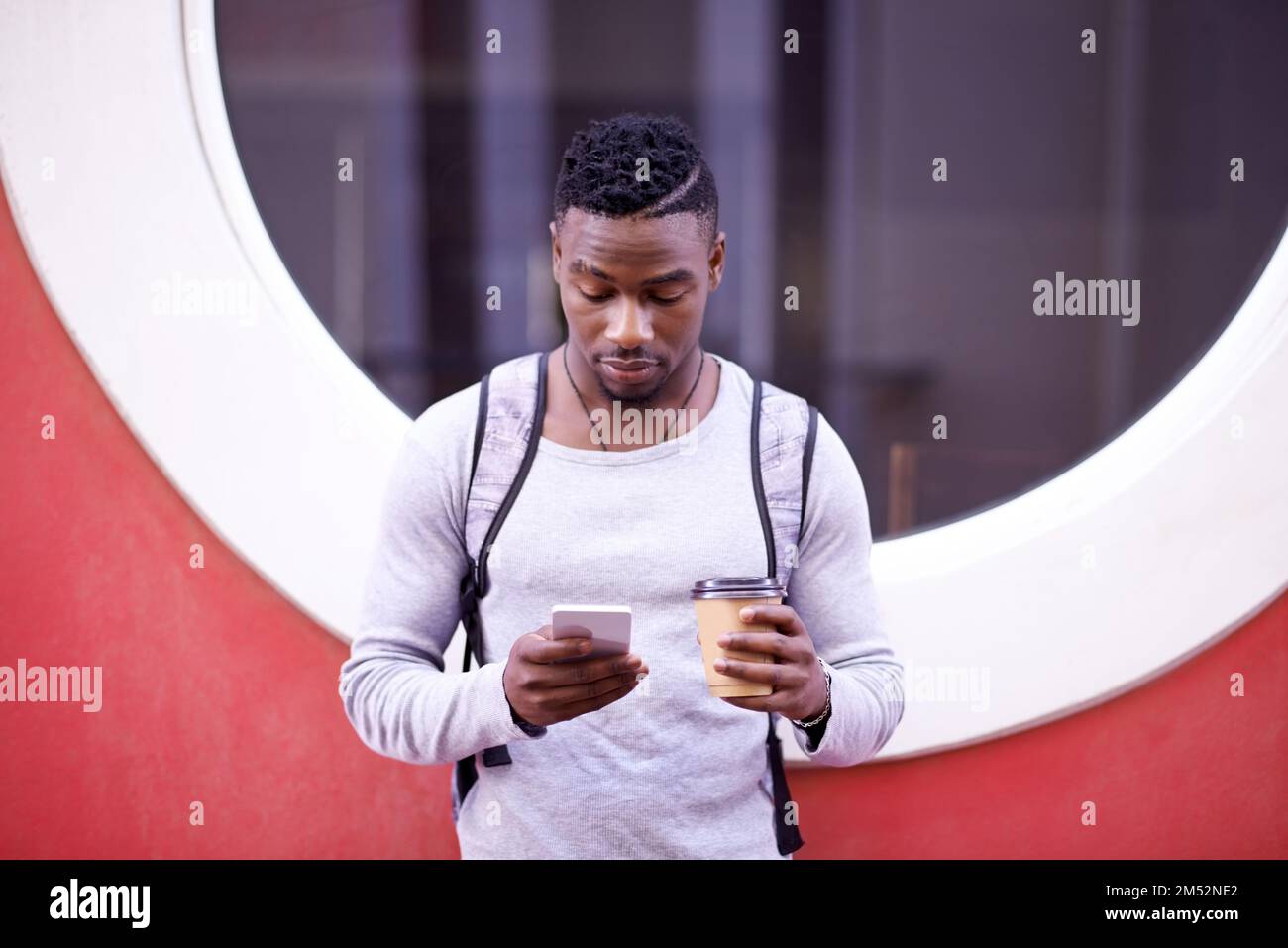 Ill have to look for directions online. a young man using his phone ...