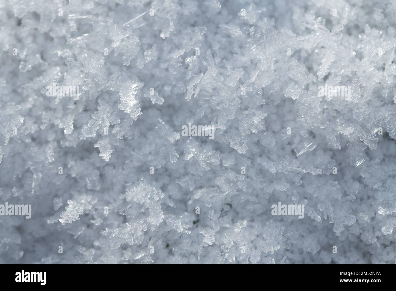 Background and texture of frozen snow from above. You can see the ice ...