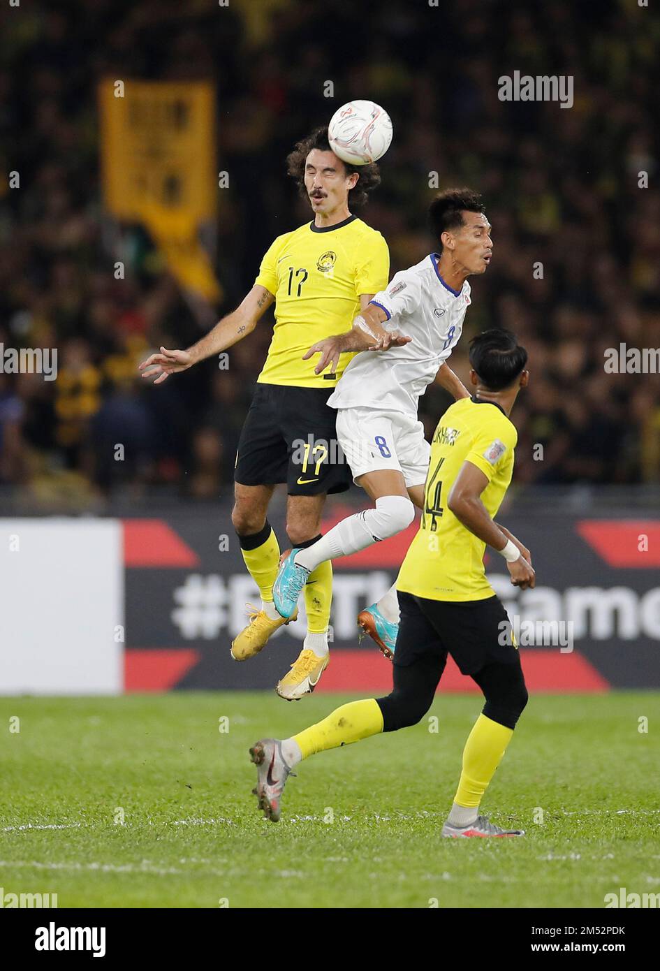 David William Rowley of Malaysia (L) and Manolom Phetphakdy of Laos (C ...