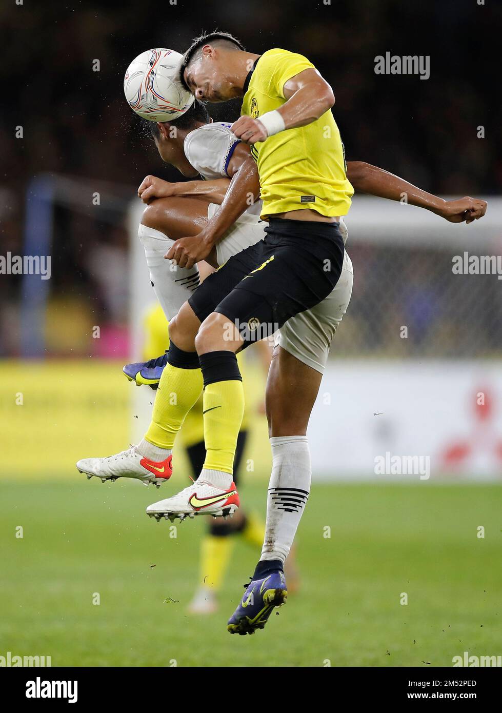 Brendan Seng Ling Gan of Malaysia (R) and Ekkamai Ratxachak of Laos in ...