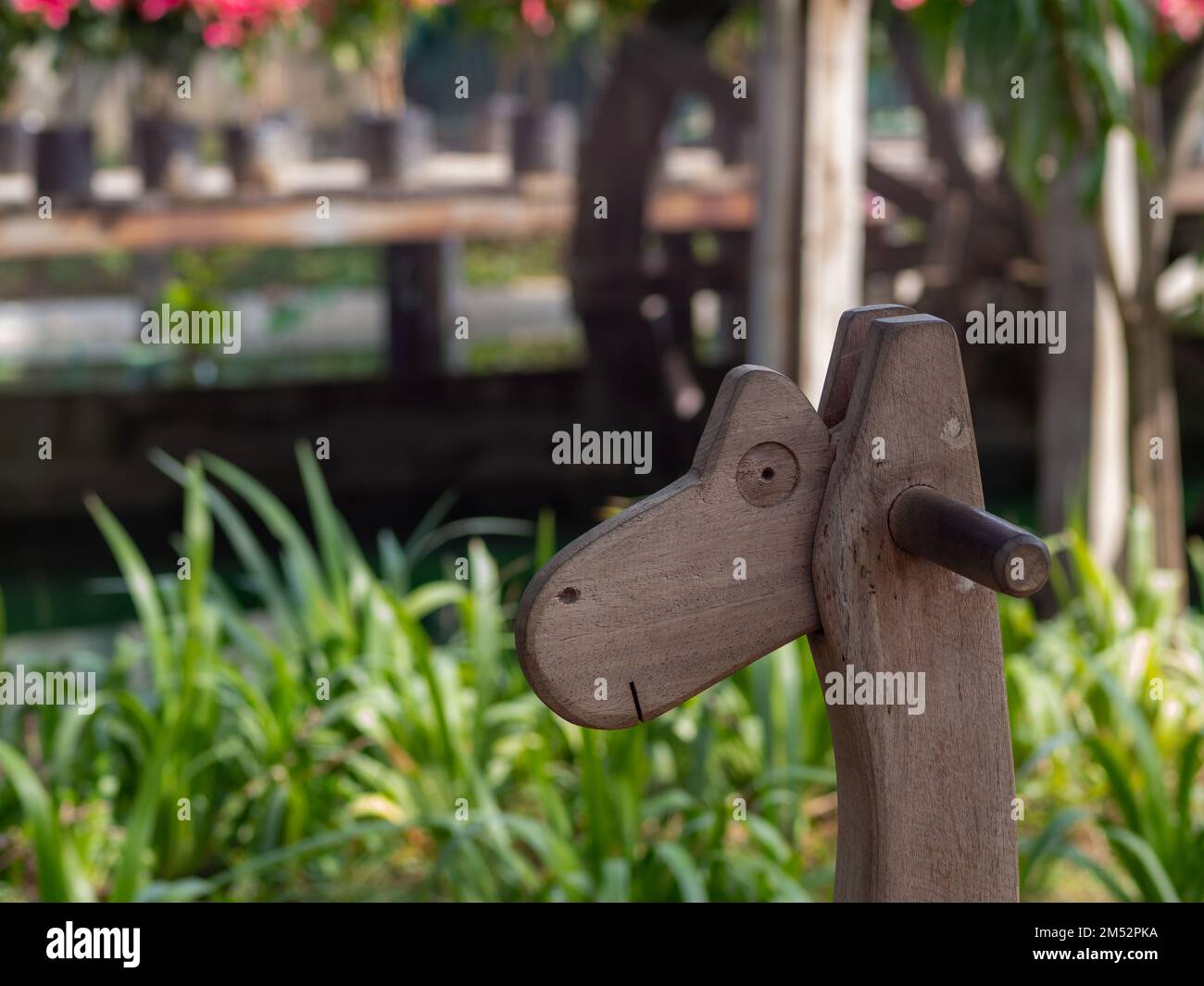 old carousel made of wood Stock Photo - Alamy