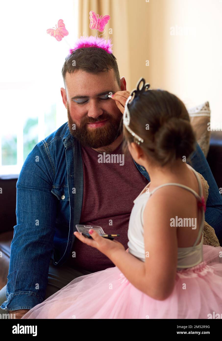 Hes a pretty amazing dad. an adorable little girl putting makeup on her ...
