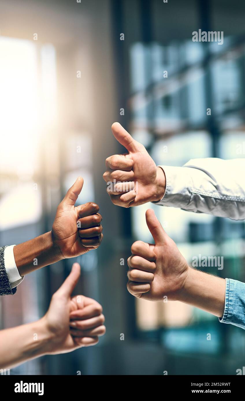 Thumbs up group candid hi-res stock photography and images - Alamy