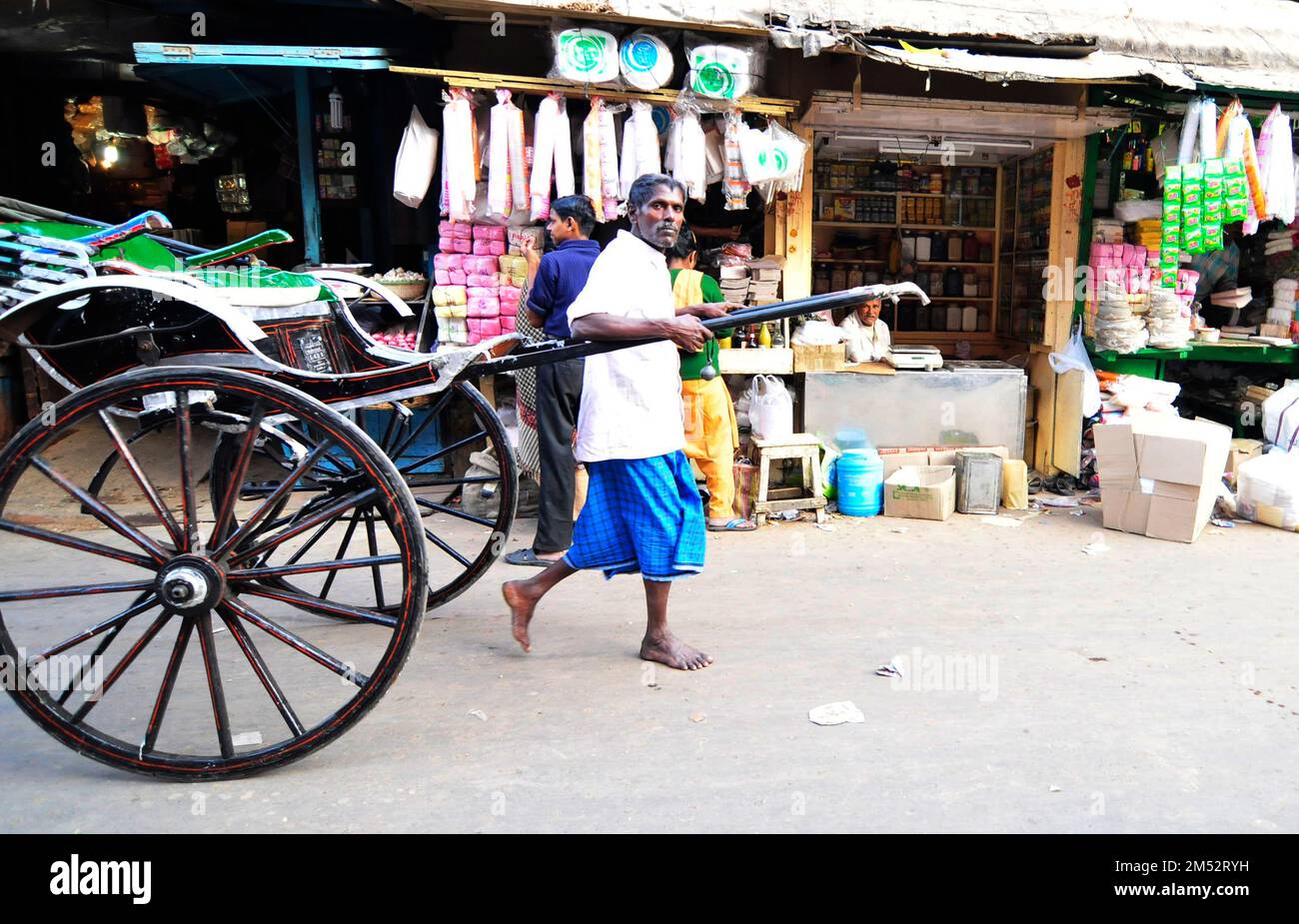 Hand pulled rickshaw in the streets of Kolkata, West Bengal, India ...
