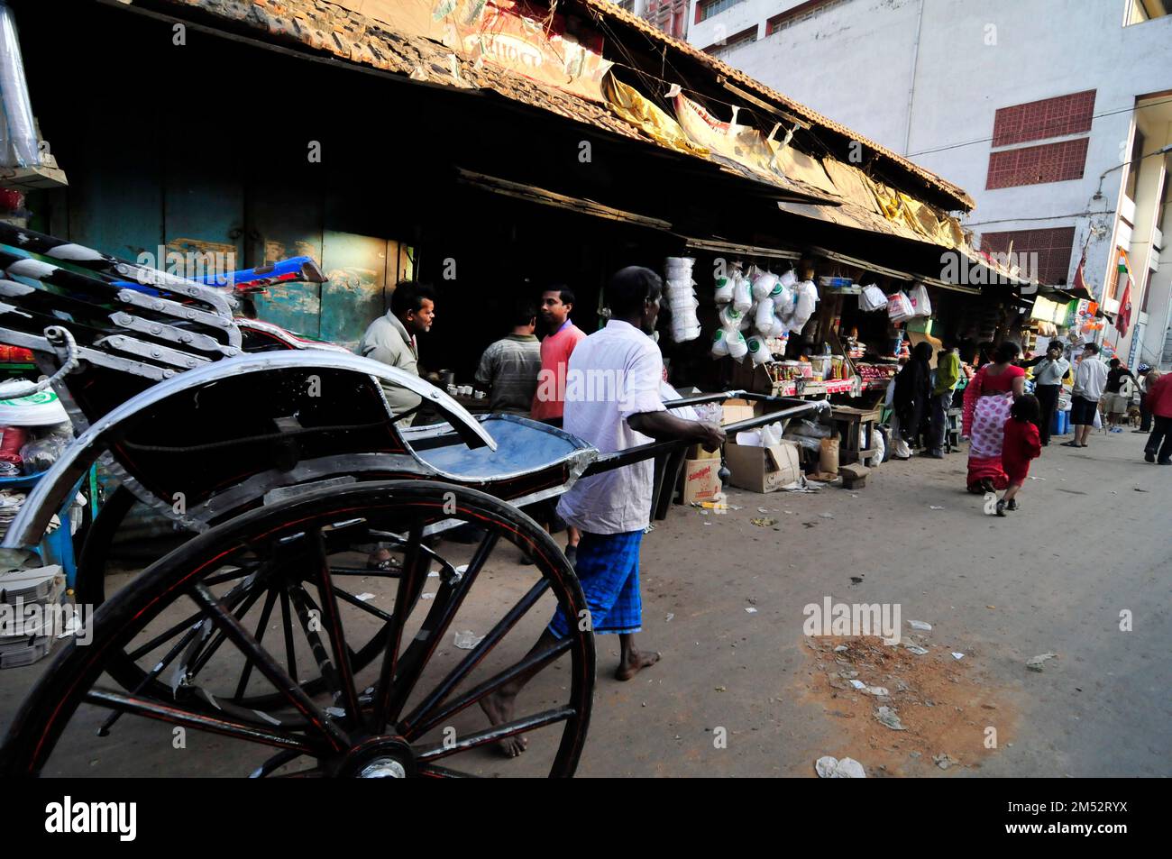 Hand pulled rickshaw in the streets of Kolkata, West Bengal, India ...