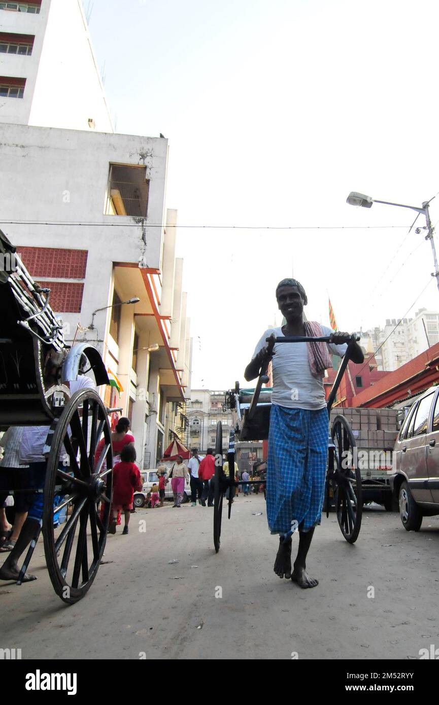 Hand pulled rickshaw in the streets of Kolkata, West Bengal, India ...