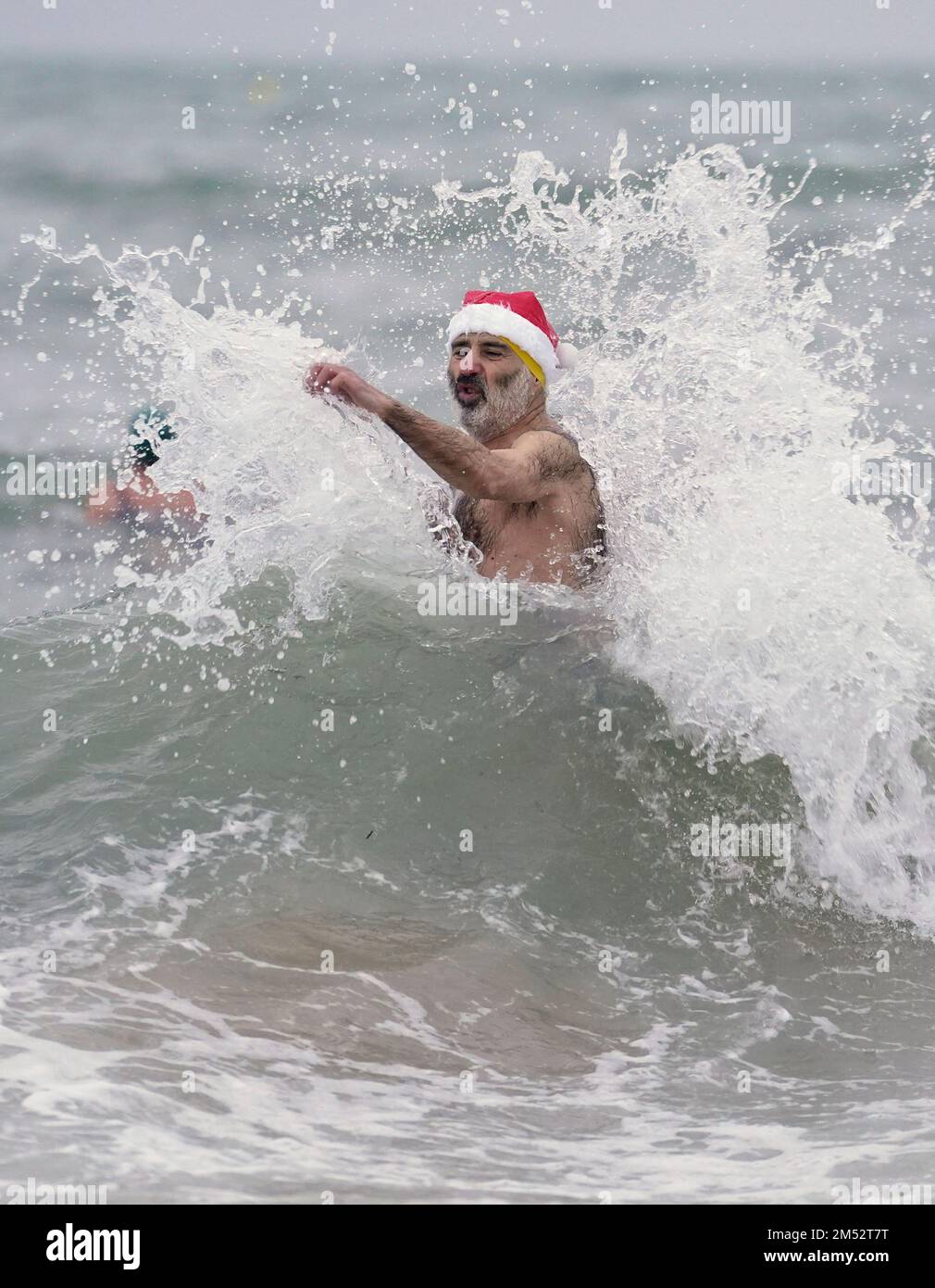 A swimmer takes an early morning dip on Christmas Day, at Boscombe ...