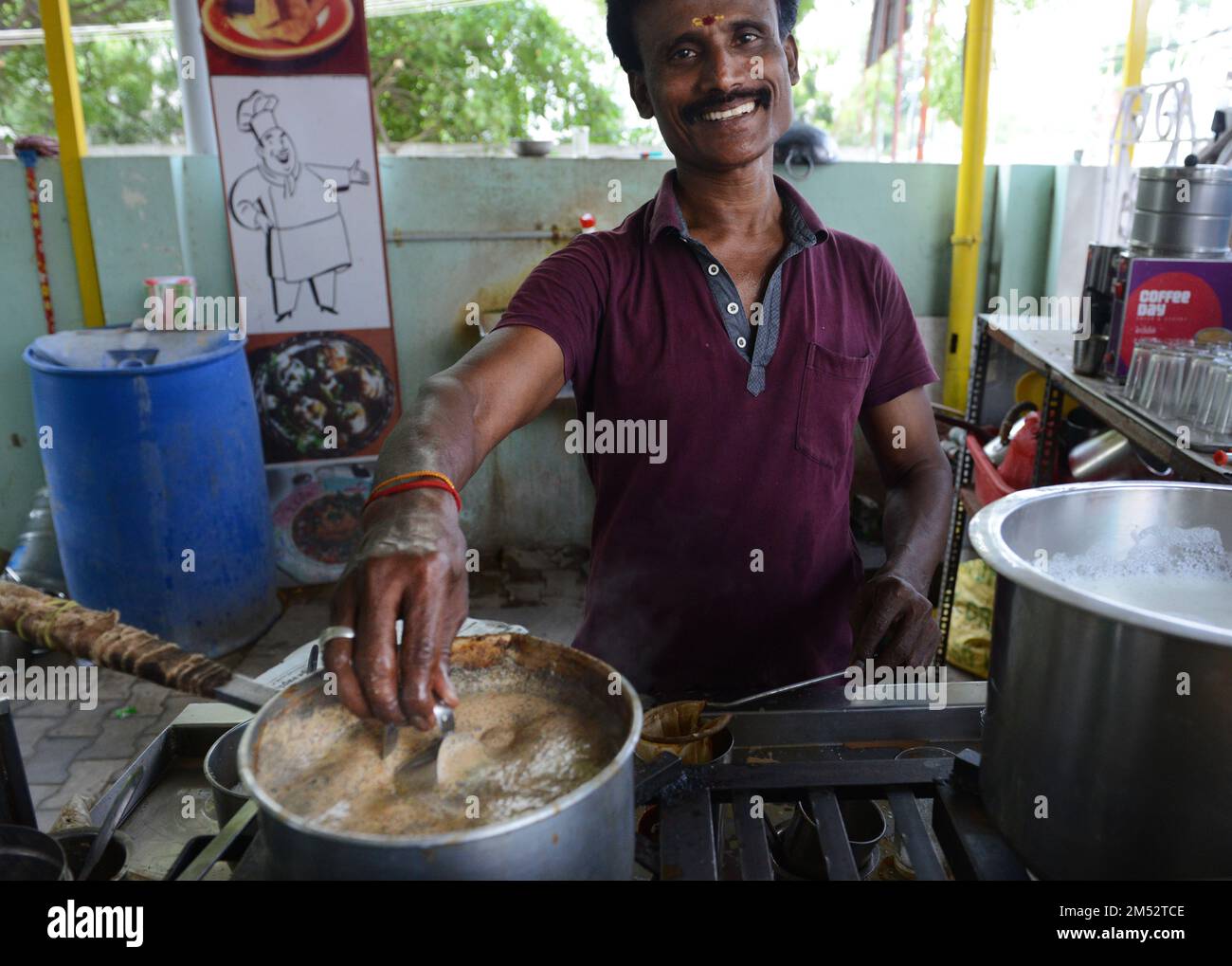 Indian Chai prepared in a small tea house in Madurai, India Stock Photo ...