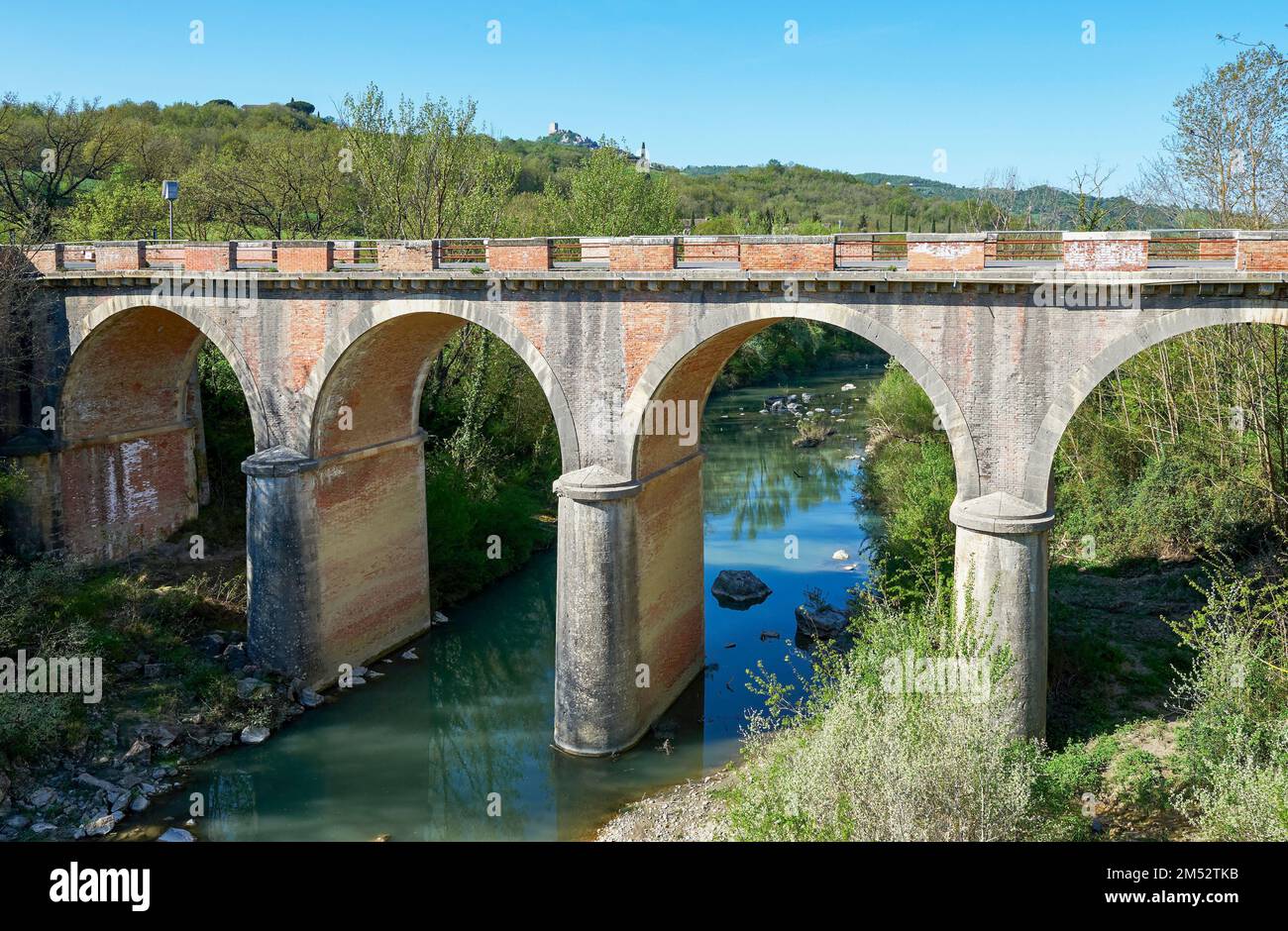 Old stone transport bridge in Tuscan countryside Stock Photo - Alamy