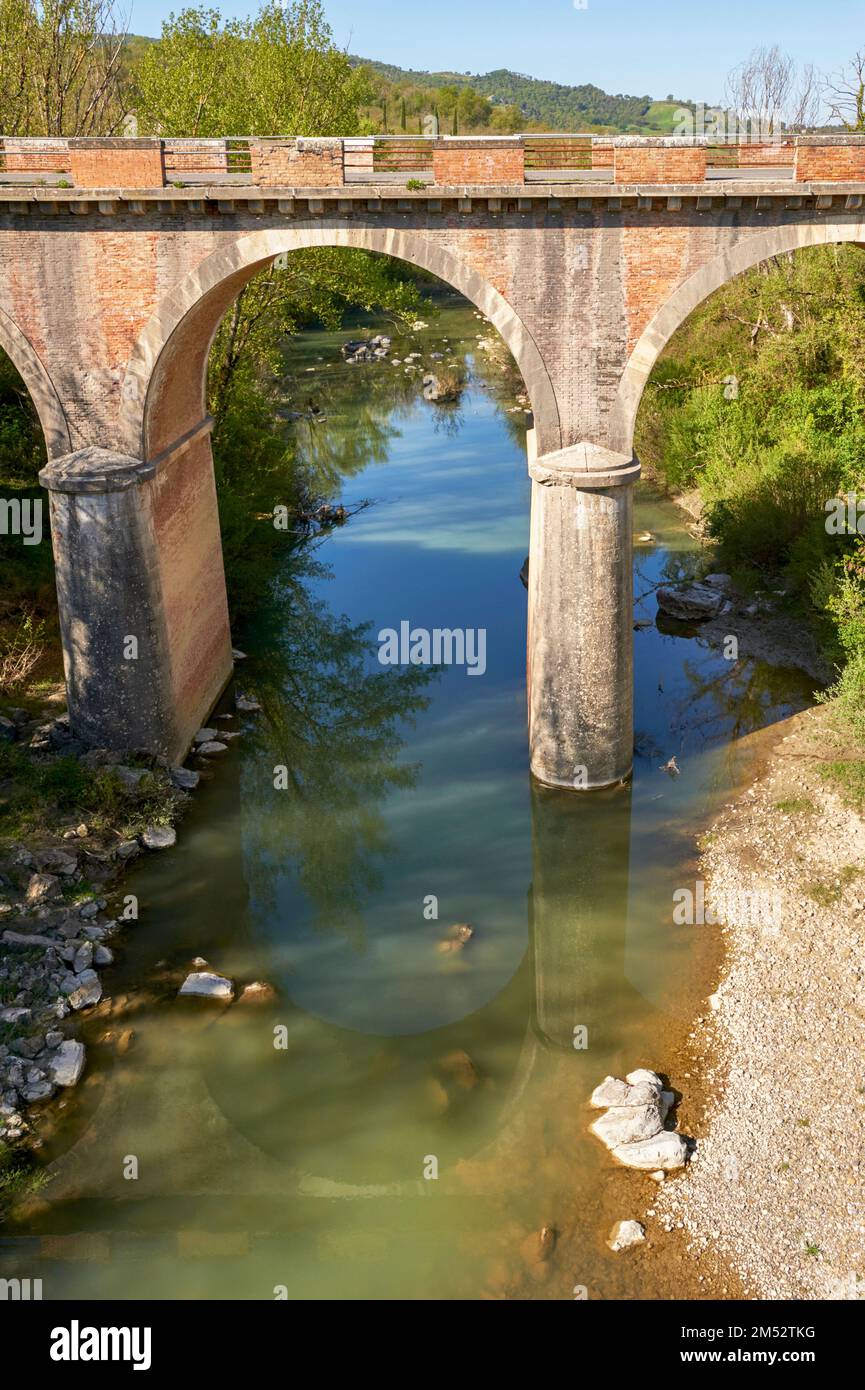 Old stone transport bridge in Tuscan countryside Stock Photo - Alamy