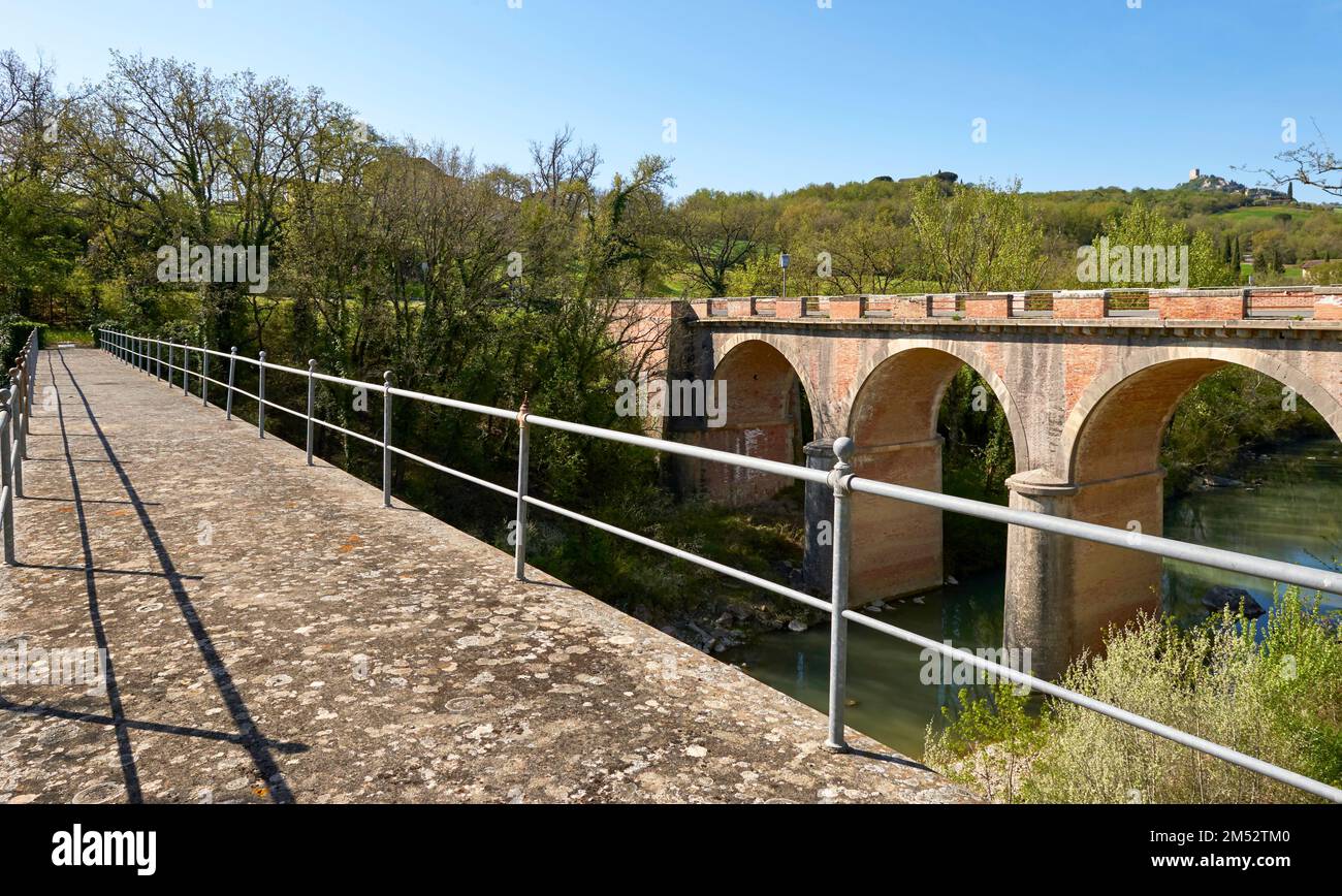 Old stone transport bridge in Tuscan countryside Stock Photo - Alamy