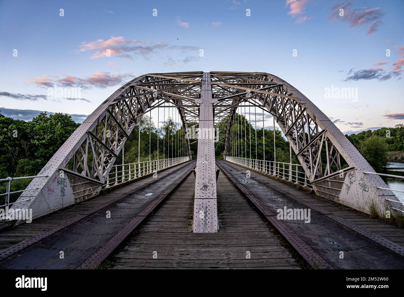 The Hagg Bank Bridge under the blue sky. Wylam, Northumberland, England ...