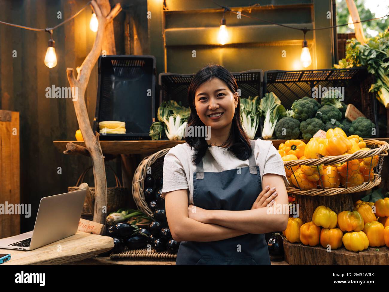 Woman standing seller market stall hi-res stock photography and images ...