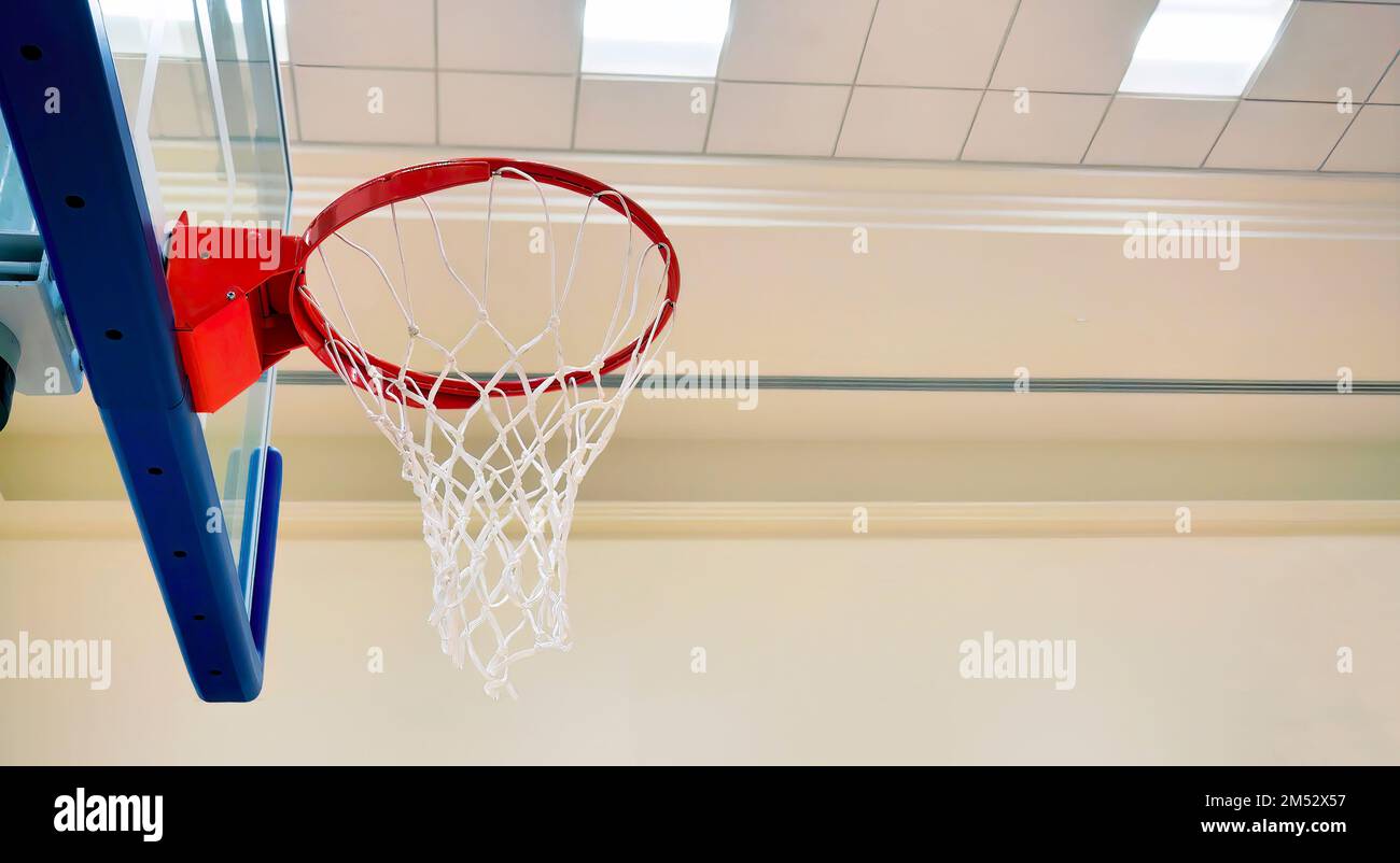 Close up Indoor gym Basketball hoop and backboard, artificial lighting ...
