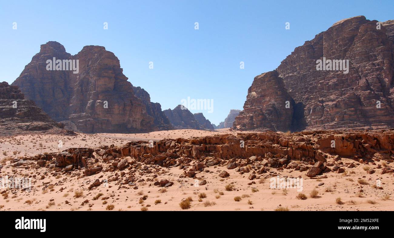 Rock formation and sand of Wadi Rum desert against blue sky. Jordan ...