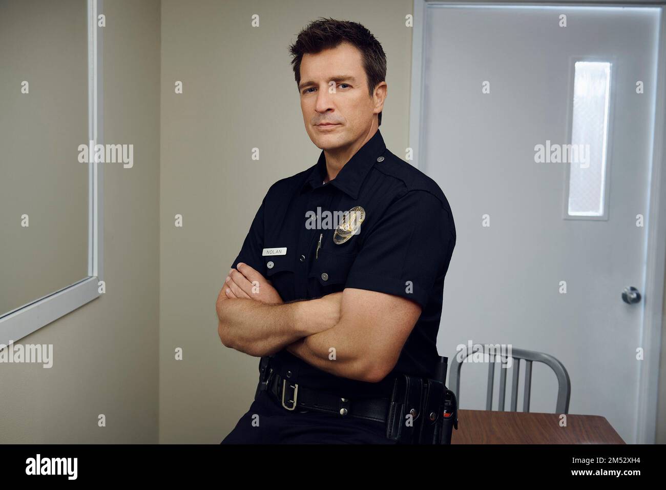 NATHAN FILLION in THE ROOKIE (2018), directed by SYLVAIN WHITE, ALEXI ...