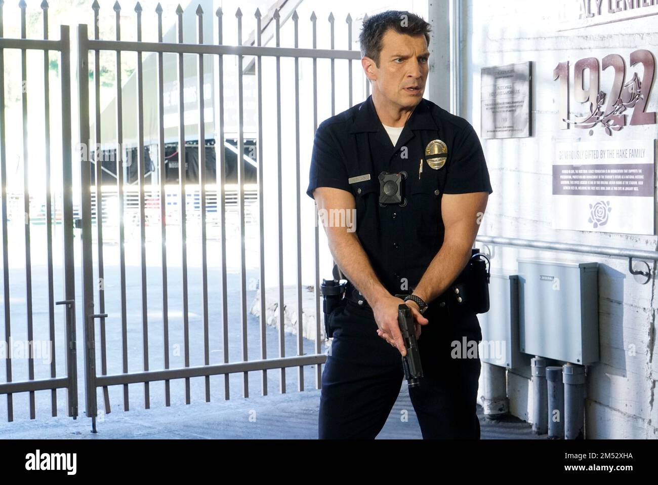 NATHAN FILLION in THE ROOKIE (2018), directed by SYLVAIN WHITE, ALEXI ...