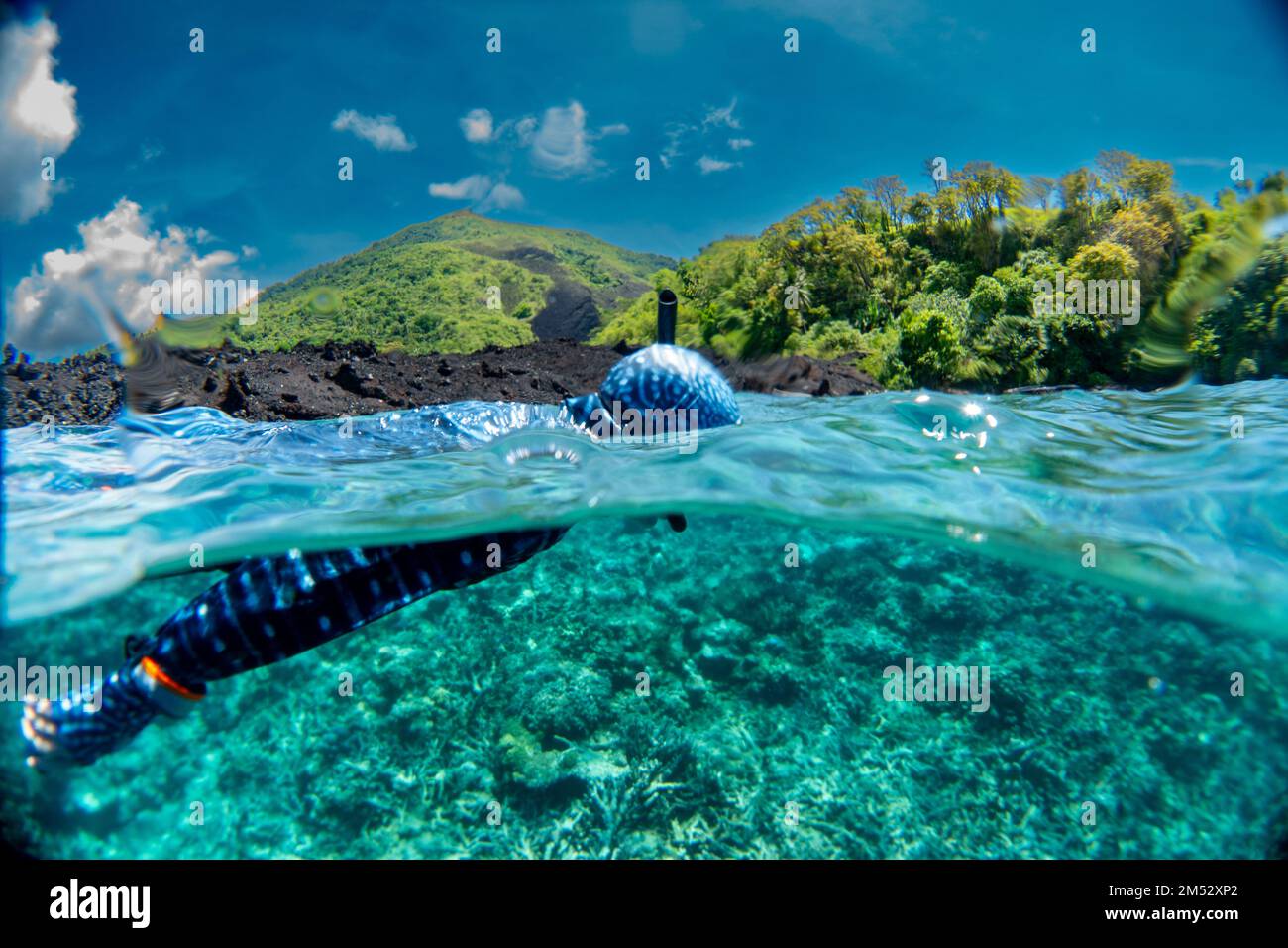 Snorkeling in the lava flow of Banda Api, Indonesia Stock Photo - Alamy