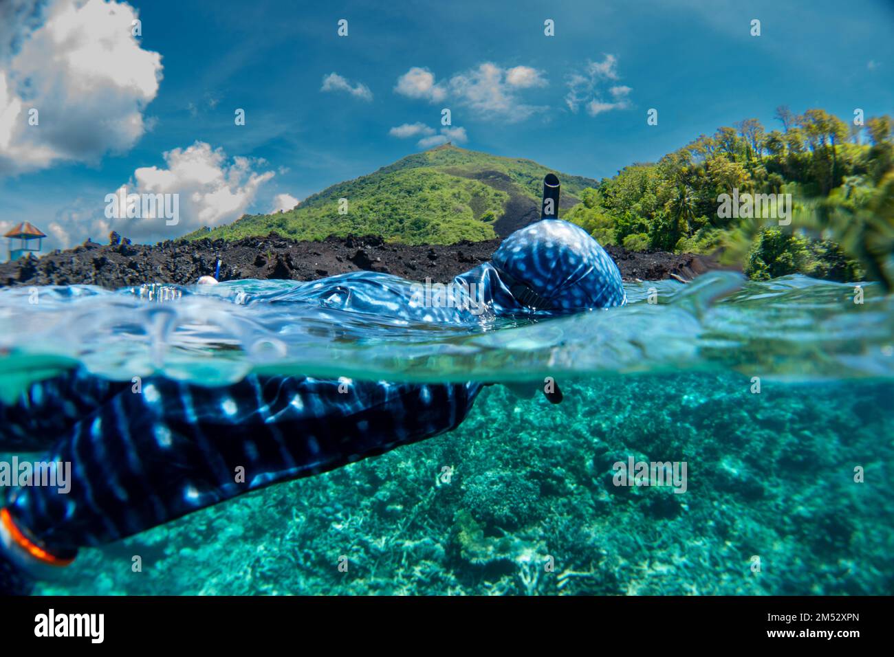 Snorkeling in the lava flow of Banda Api, Indonesia Stock Photo - Alamy
