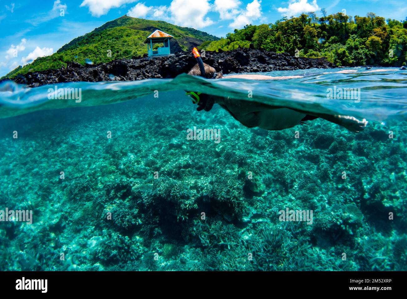 Snorkeling in the lava flow of Banda Api, Indonesia Stock Photo - Alamy