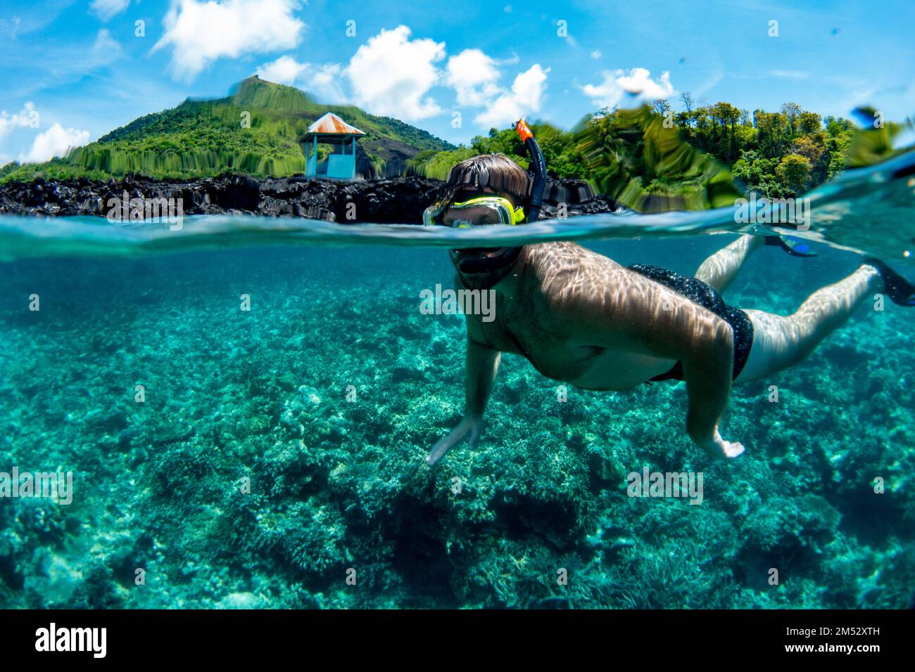 Snorkeling in the lava flow of Banda Api, Indonesia Stock Photo - Alamy