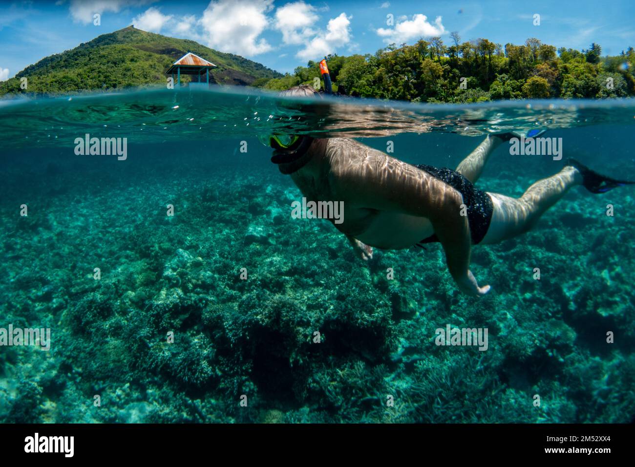 Snorkeling in the lava flow of Banda Api, Indonesia Stock Photo - Alamy