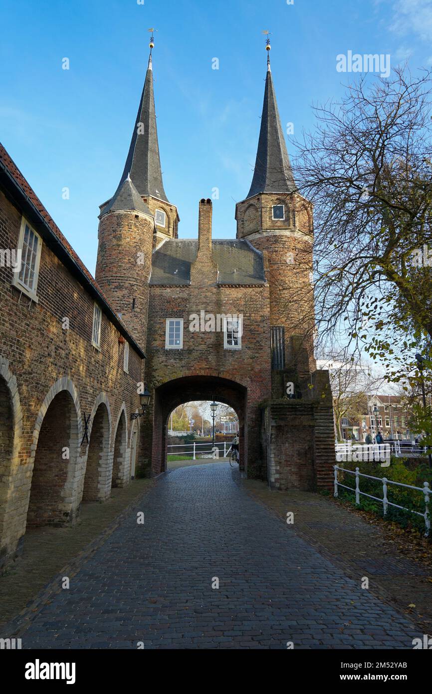 A cobblestone path leading into the eastern gate or Oospoort in Delft ...