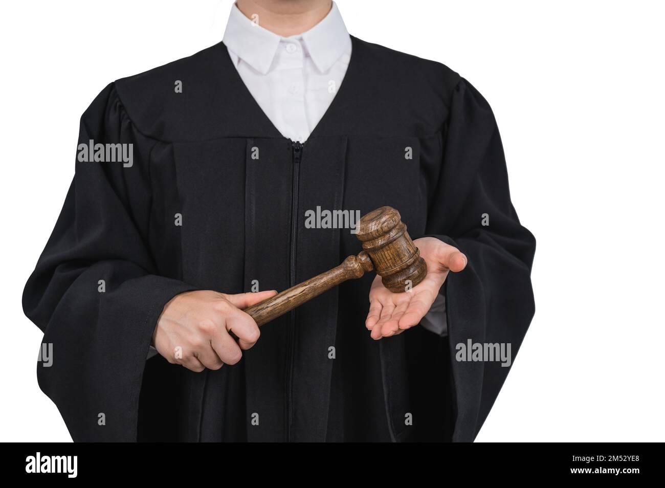 Faceless female judge in a robe holding a court gavel Stock Photo - Alamy