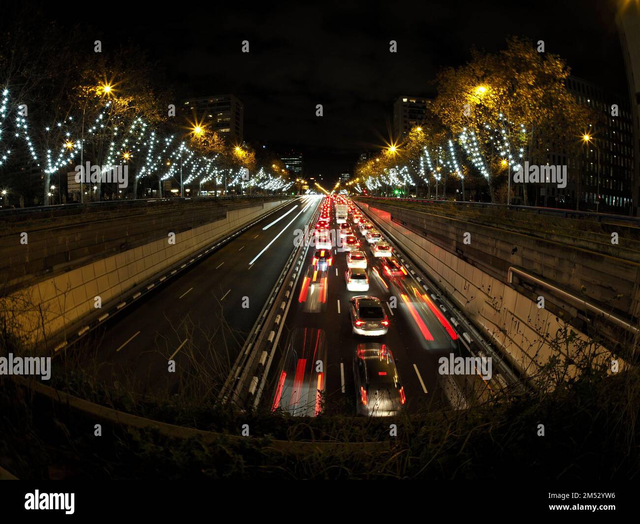 view of a traffic jam in madrid castilla place at night with car lights ...
