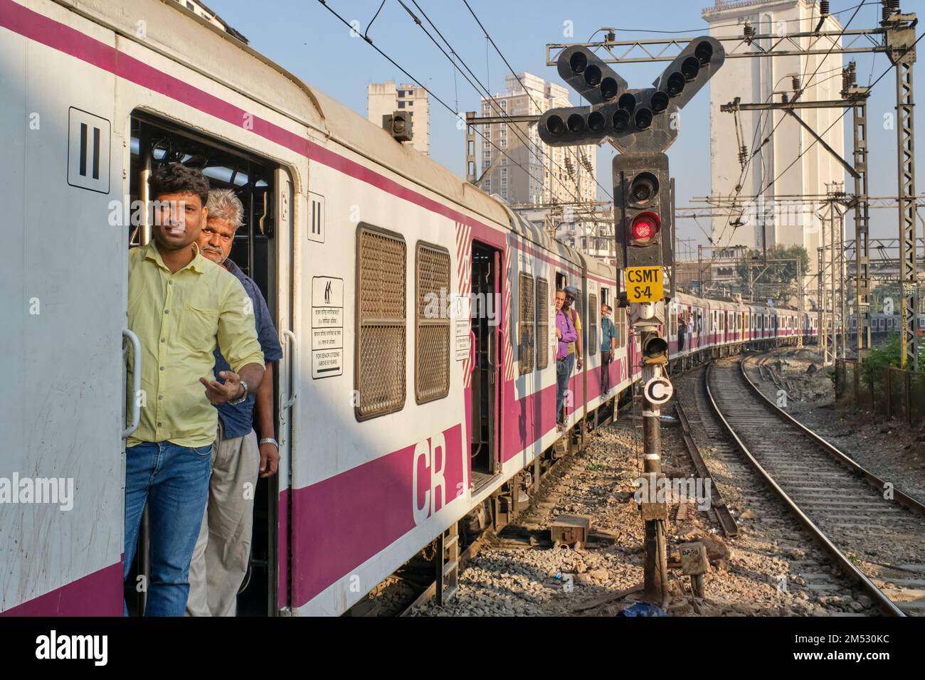 A local commuter train arriving at Chhatrapati Shivaji Maharaj Terminus ...