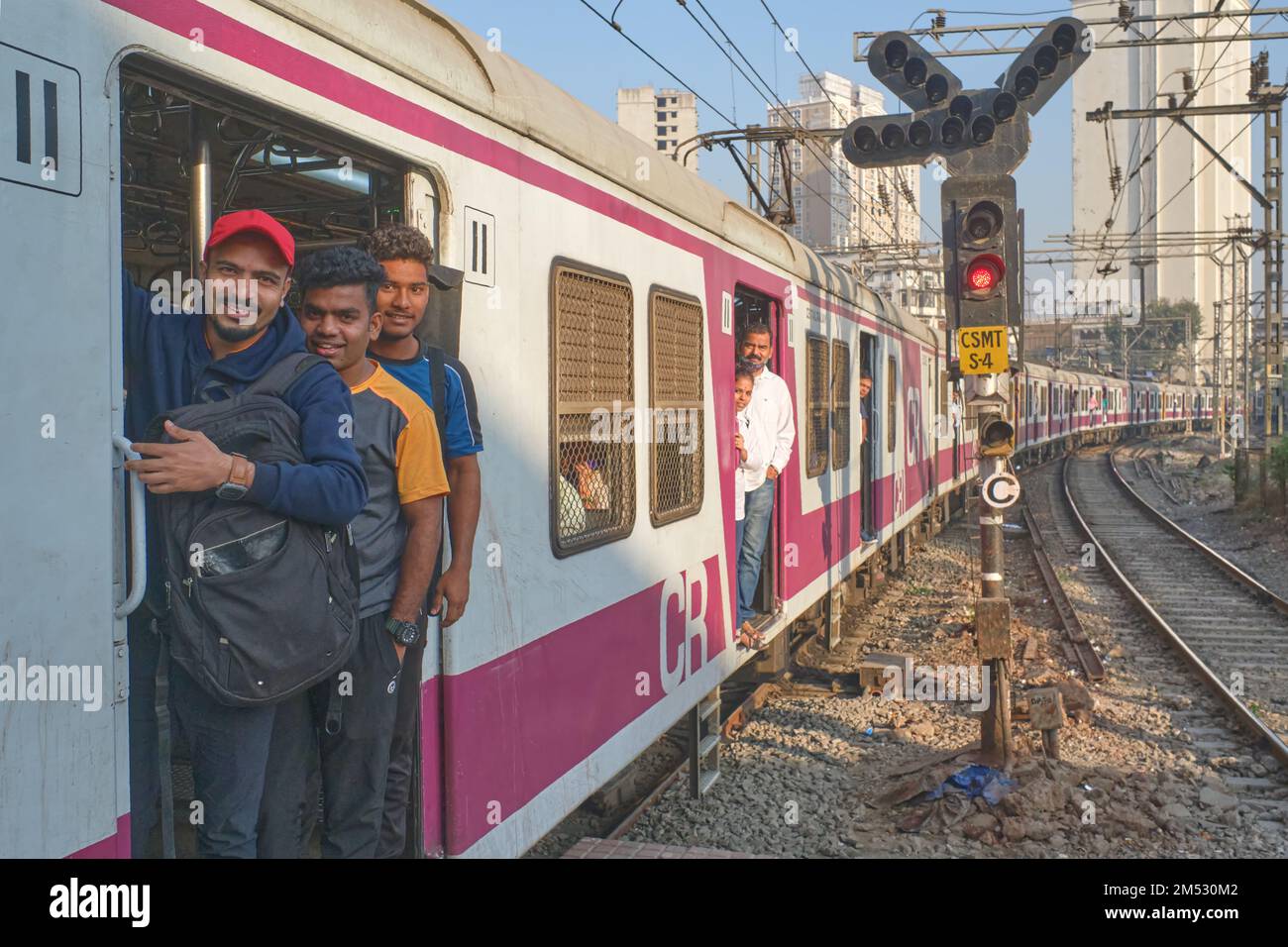 A local commuter train arriving at Chhatrapati Shivaji Maharaj Terminus ...