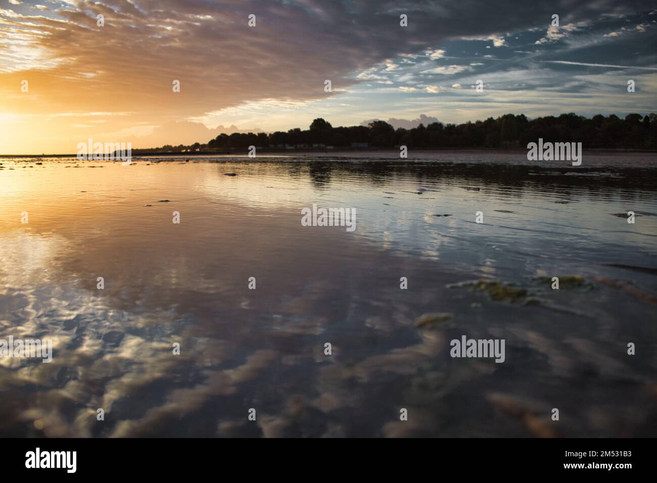 A beautiful view of a sunset over Appley beach in Ryde, Isle of Wight ...