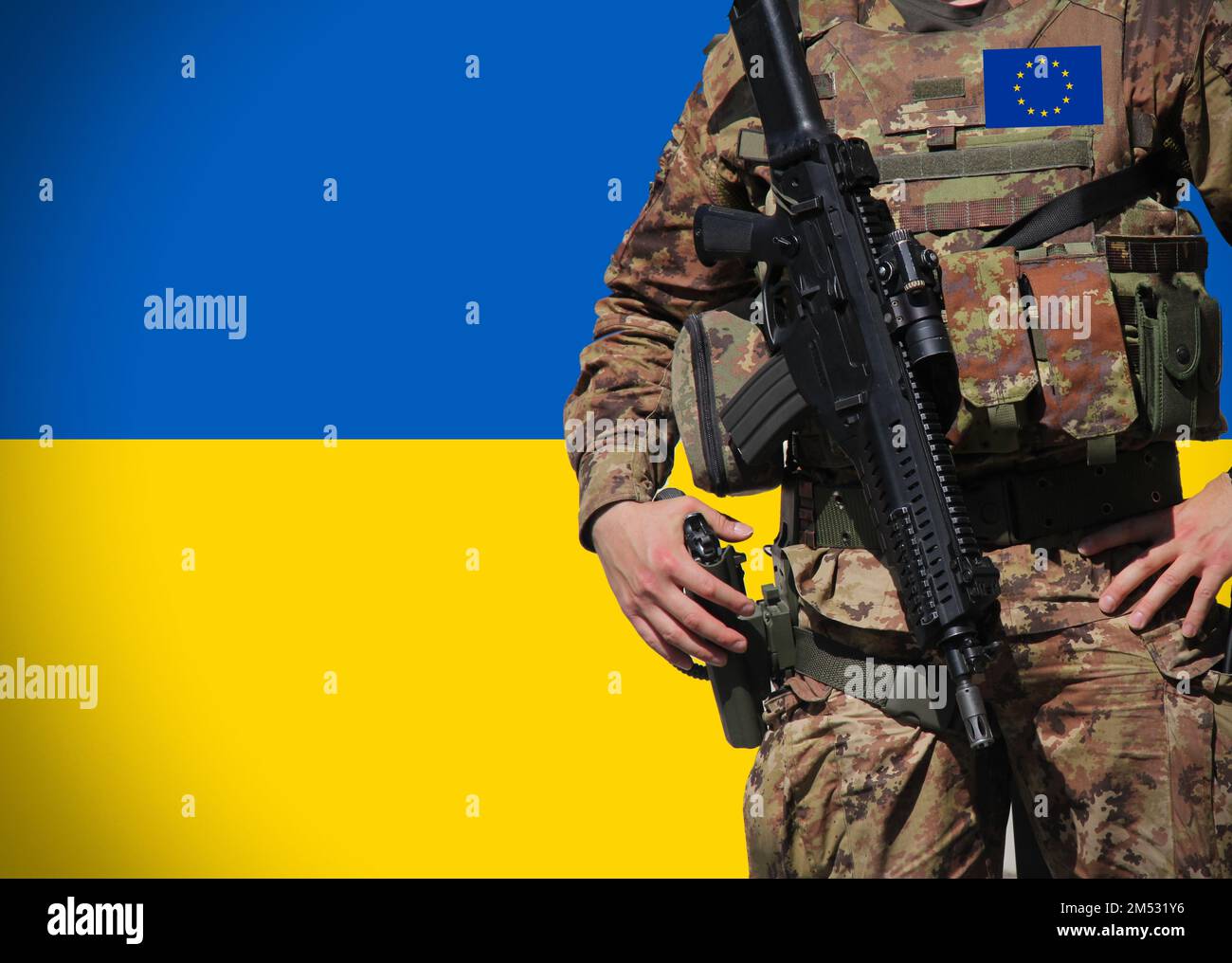 Ukrainian flag with an European Soldier as background Stock Photo - Alamy