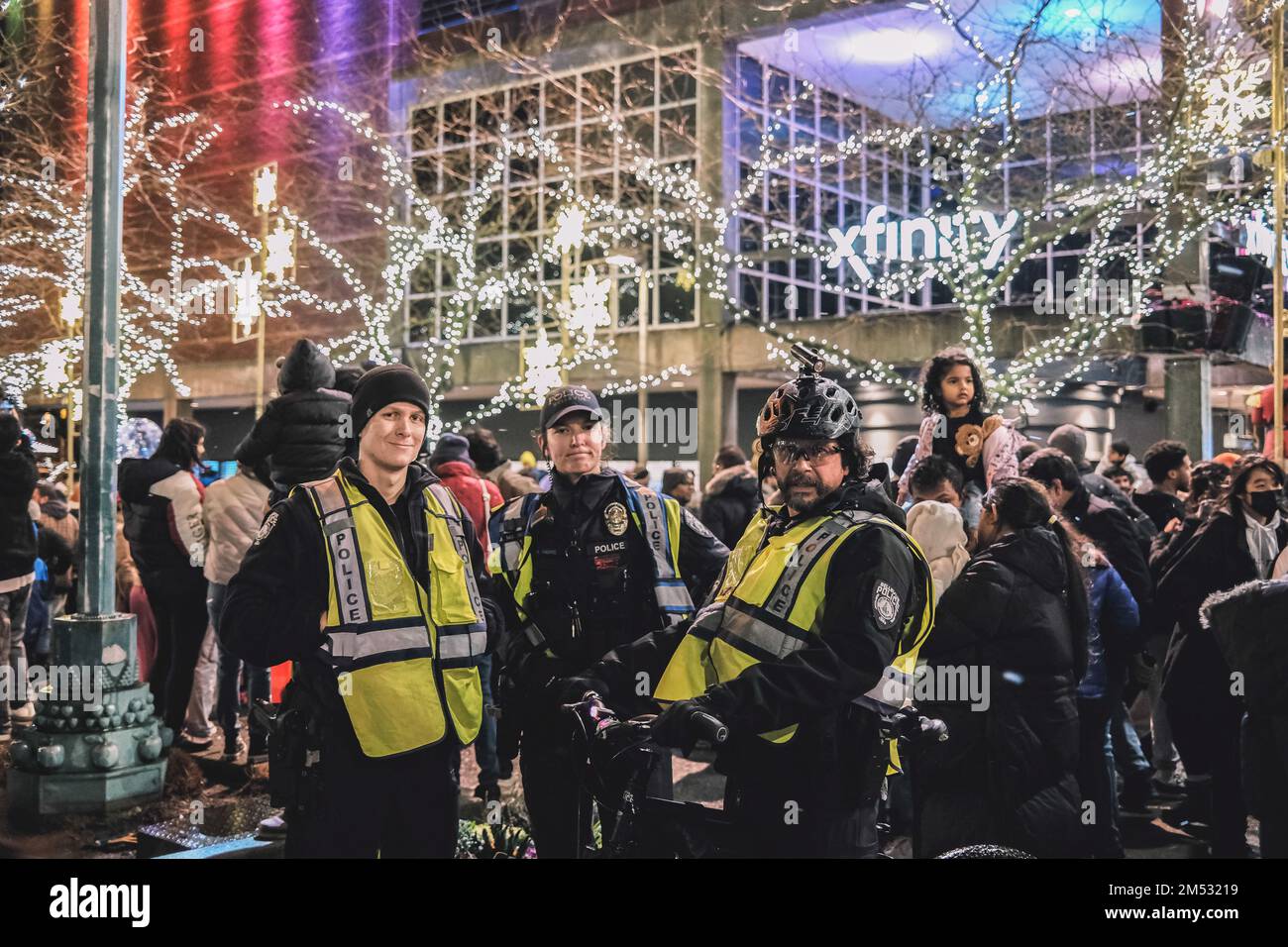 Police officers seen guarding the venue. Nearly a thousand people ...