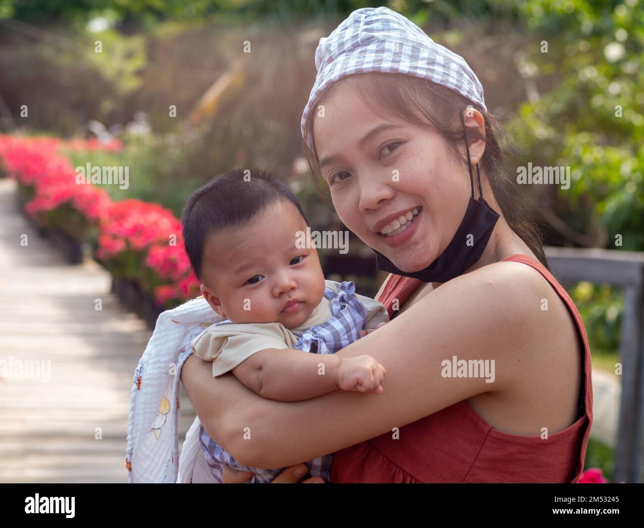 Woman and baby Asian and nationality Thai is happy feel Stock Photo - Alamy