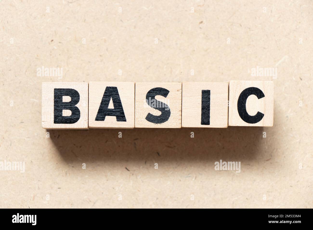 Alphabet letter block in word basic on wood background Stock Photo - Alamy