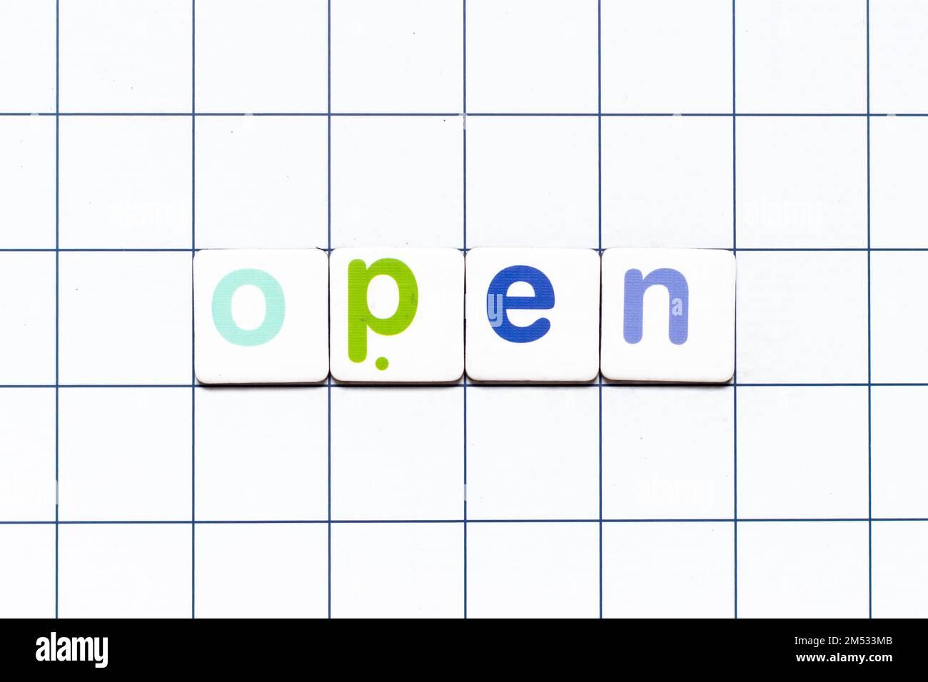 Colorful tile letter in word open on white grid background Stock Photo ...