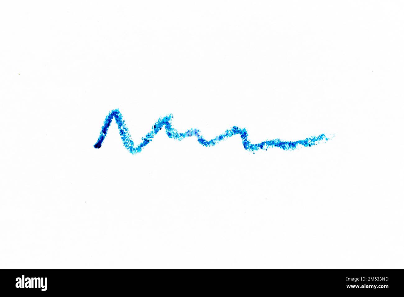 Blue color crayon hand drawing in sribble line shape on white paper ...