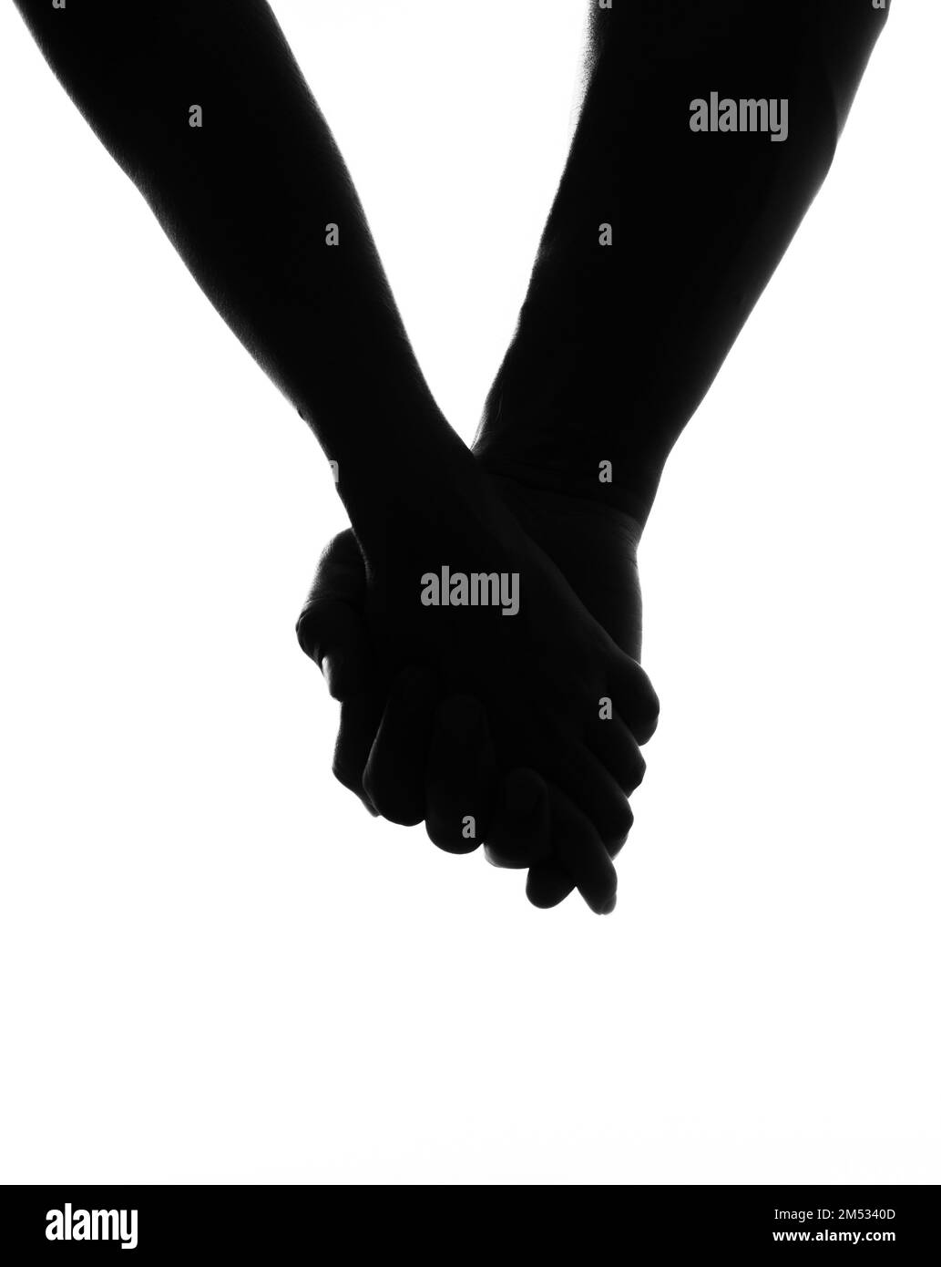 A vertical grayscale of a couple holding hands Stock Photo - Alamy